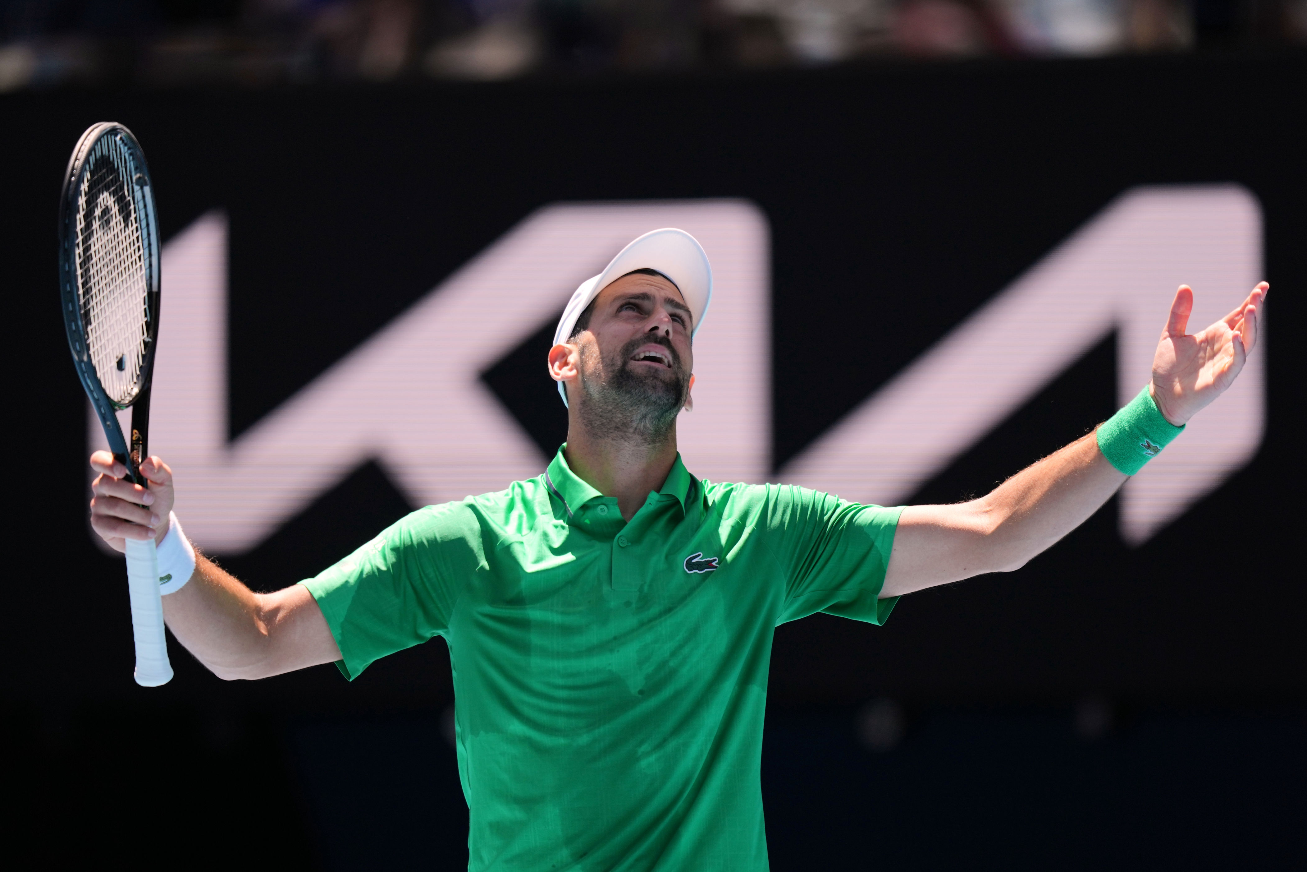 Djokovic's 399th Grand Slam match win propels him into Australian Open ...