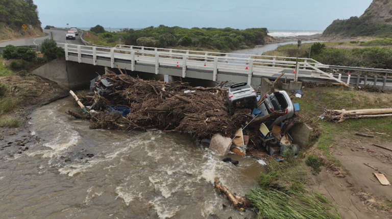 Mangled cars winched by helicopter as Wye River flood clean-up continues