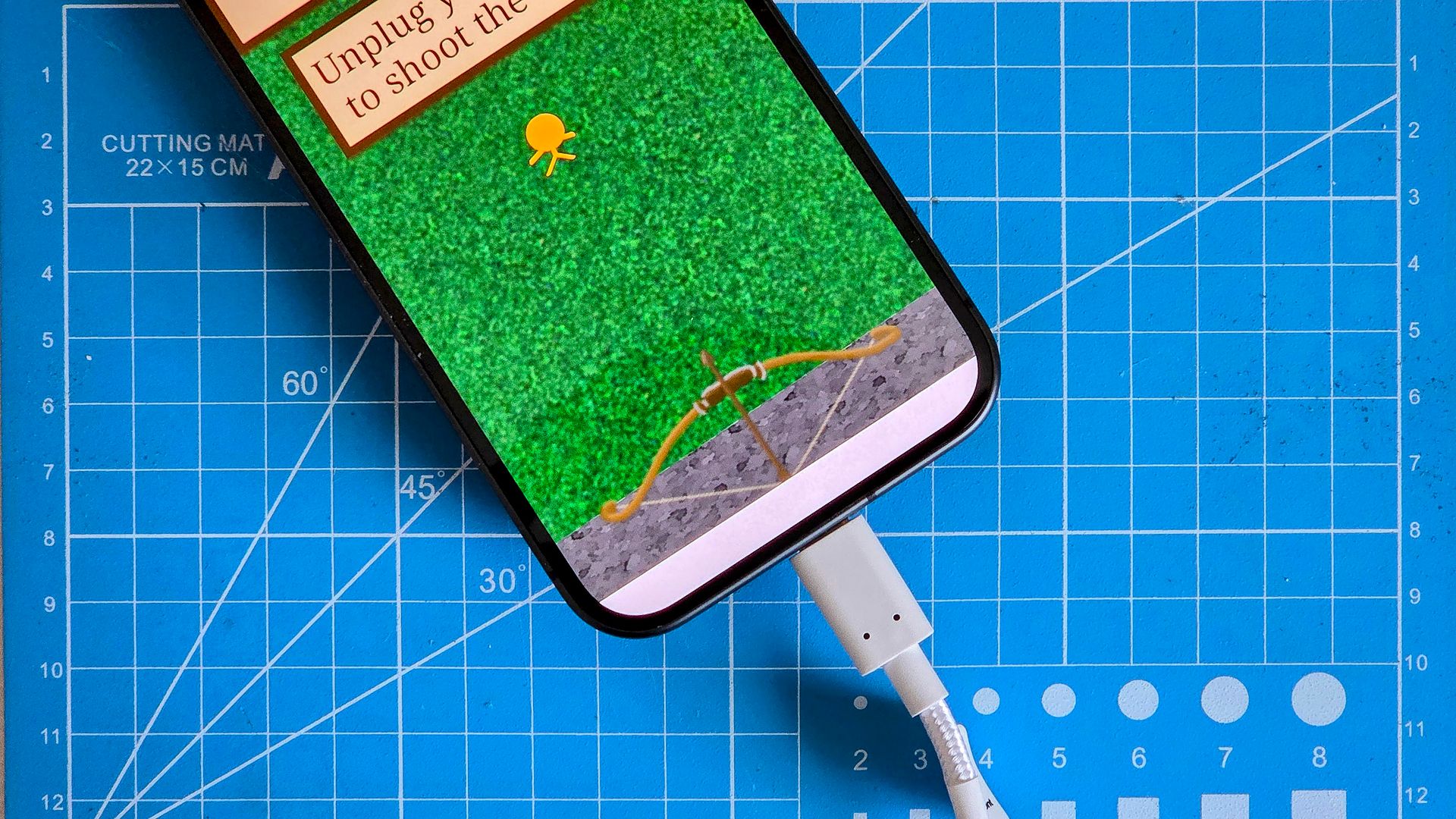 This clever Android game turns your charging cable into a bow and arrow