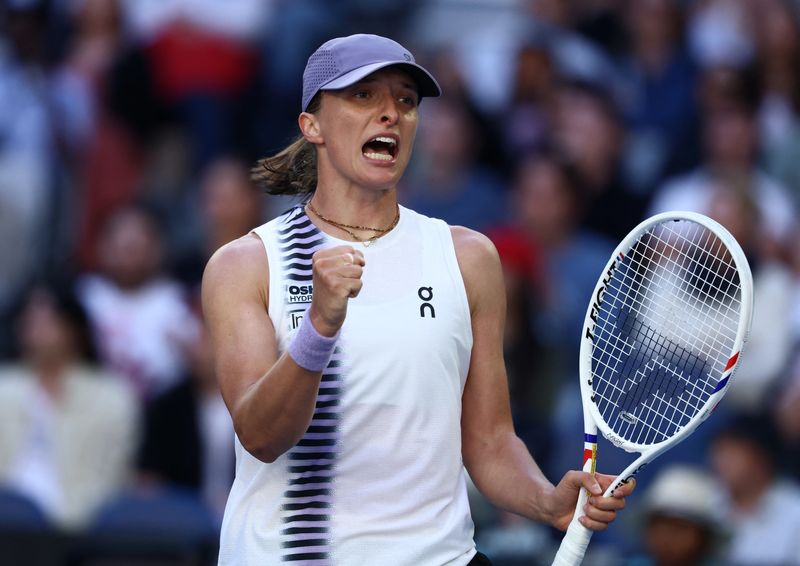 Tennis-Swiatek sees off Bouzkova to reach Australian Open third round