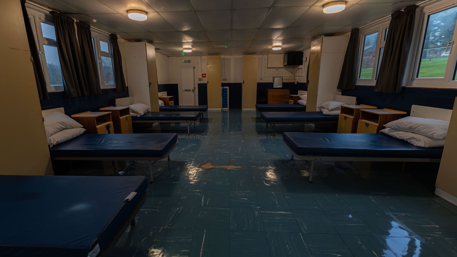 Asylum seekers moved into army camp despite local opposition