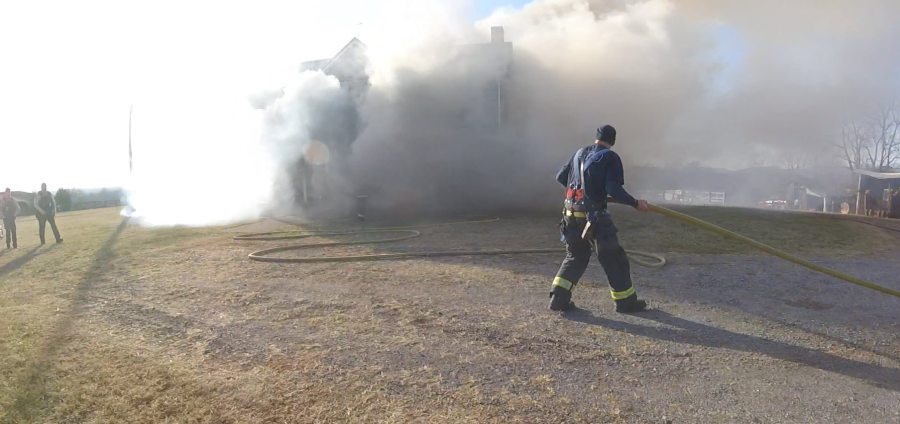 Bedford Fire Department tackles large house fire