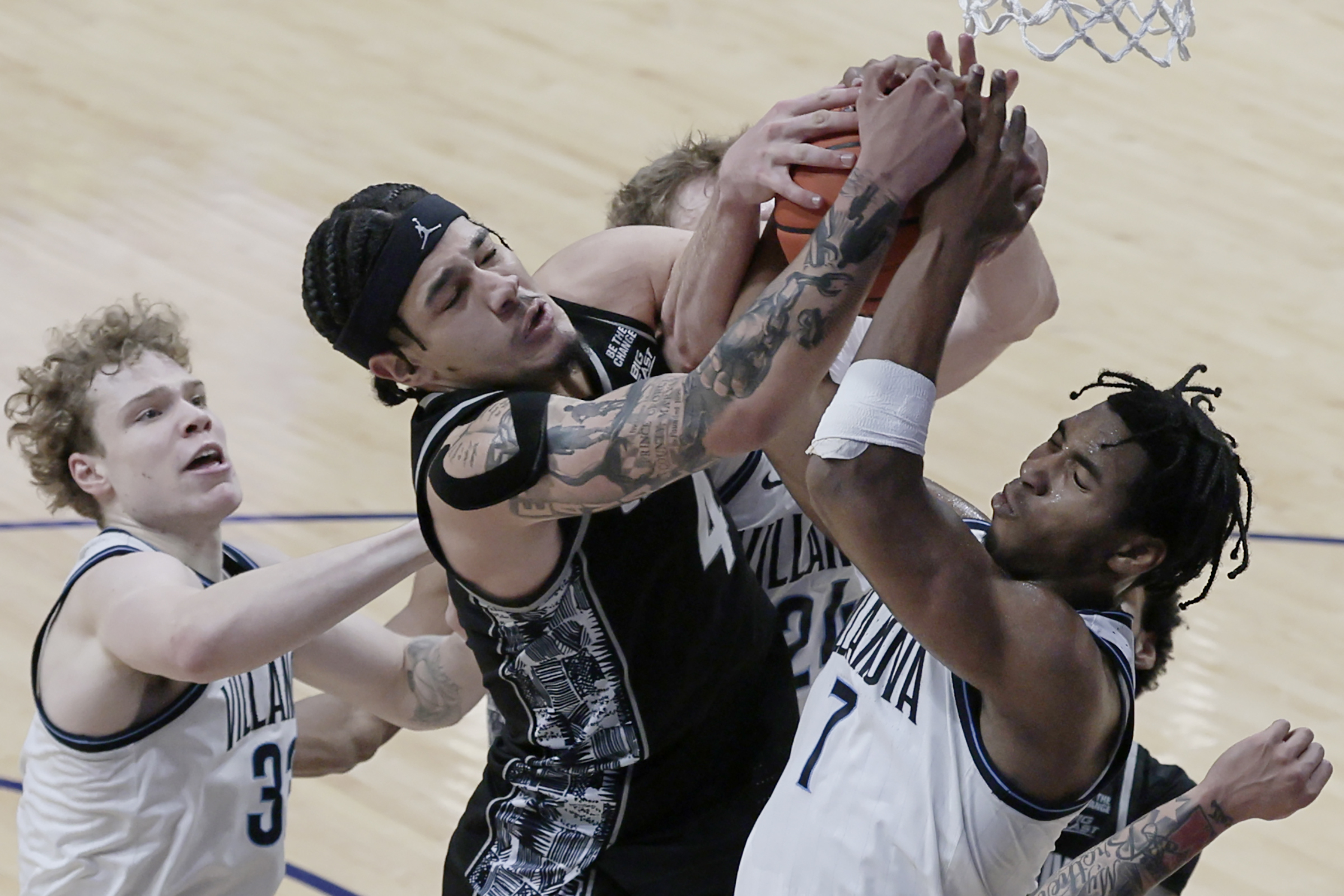 Second-half surge helps Villanova roll past Georgetown to set up a ...