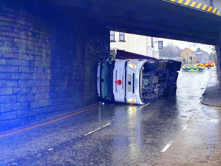 Overturned lorry leaves West Yorkshire road closed with police on scene