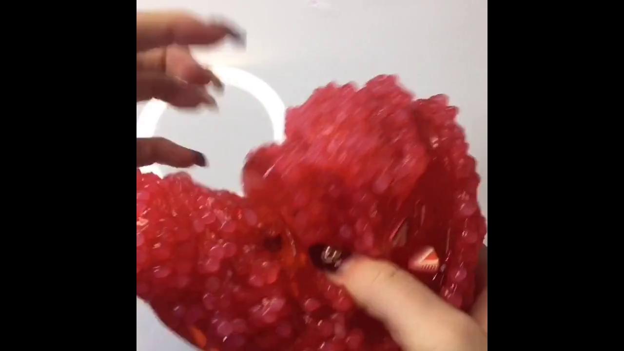 Crushing soft red slime with beads ASMR