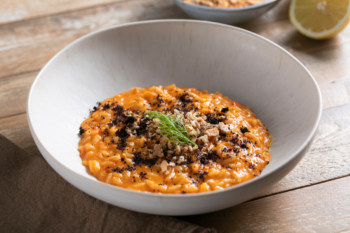 Risotto with sweet peppers and anchovy crumble