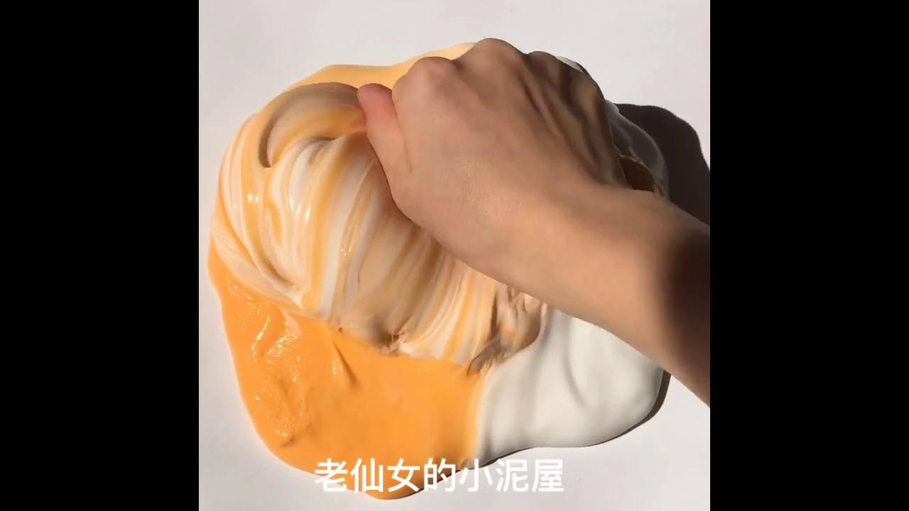 Satisfyingly mashing soft white and yellow slime