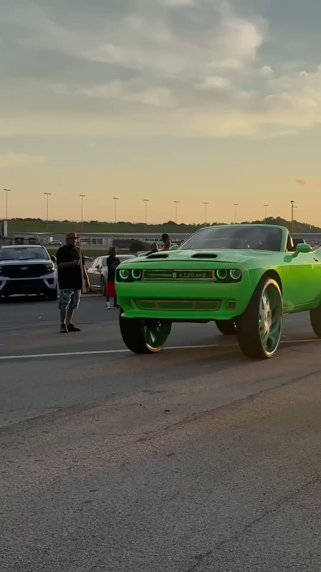 Drop-top Dodge Challenger on 34’s Forgiatos riding