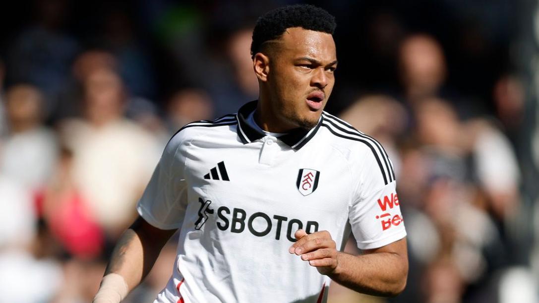 Man who sent racial abuse to footballer sentenced