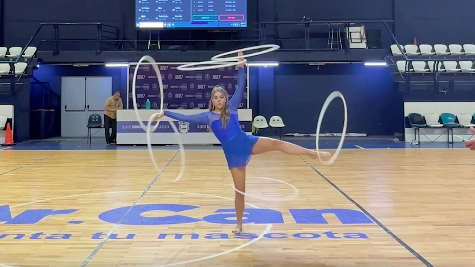 Longest duration performing a six hula hoop box split 1 minute 33 ...