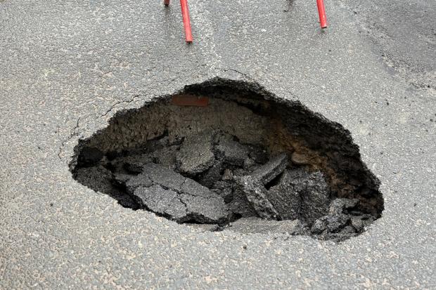 Road collapses as sinkhole opens up outside primary school