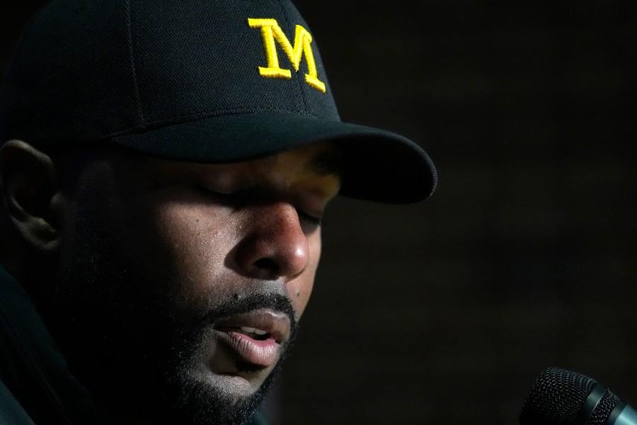 Former Michigan coach Sherrone Moore appears in court for home invasion ...