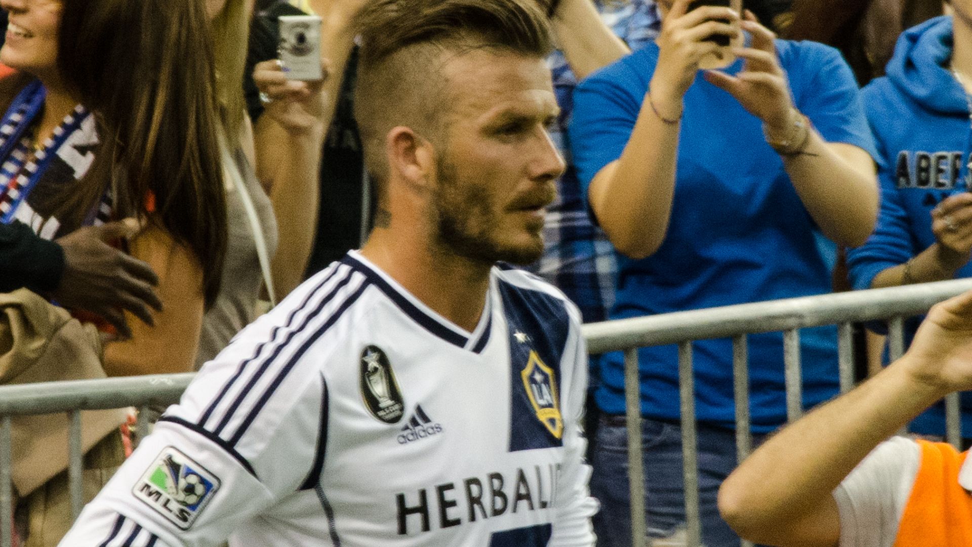 David Beckham seen removing parking ticket from Bentley