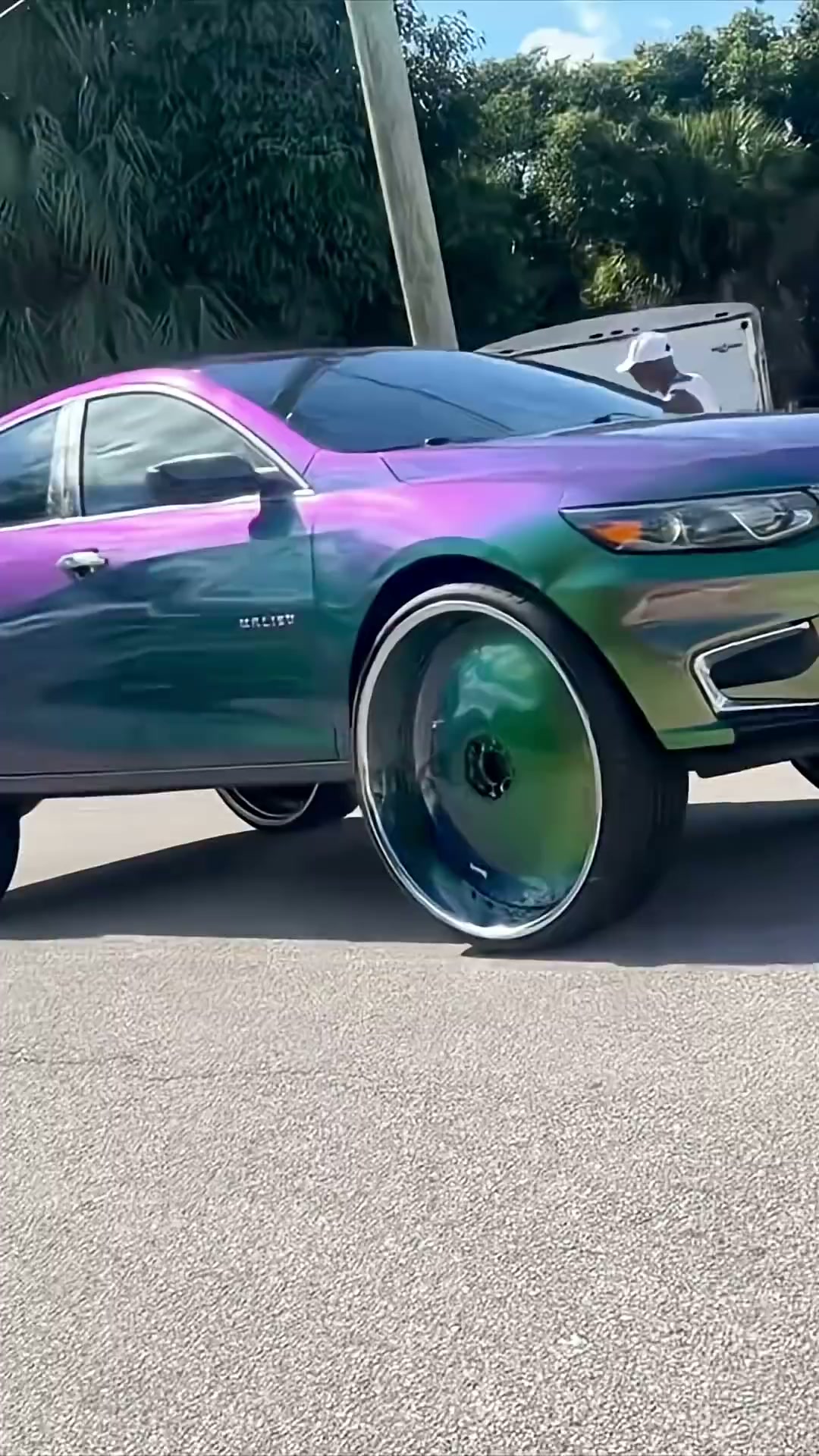 Outrageous Chevy Malibu on 30” DUBs riding