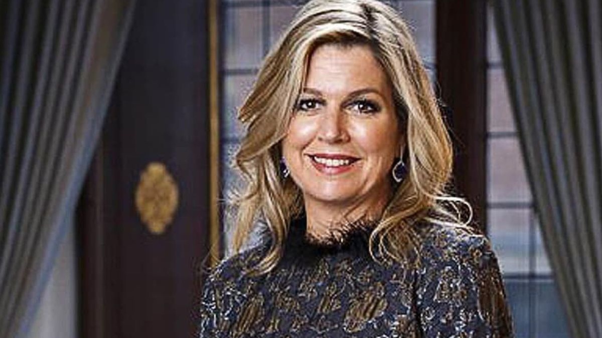 Queen Maxima and the bold orange suit set to dominate the seasons wardrobe