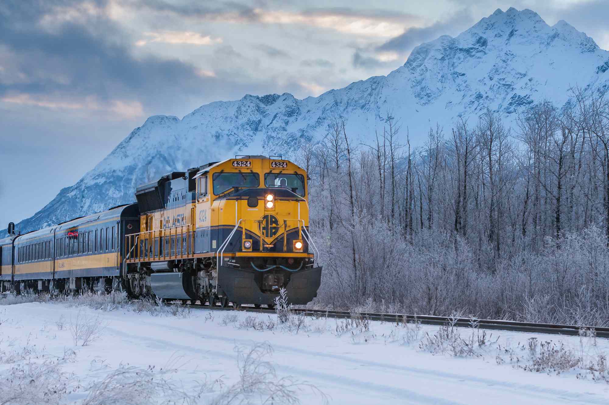 This winter train journeys to the Arctic Circle—with sled dog tours ...