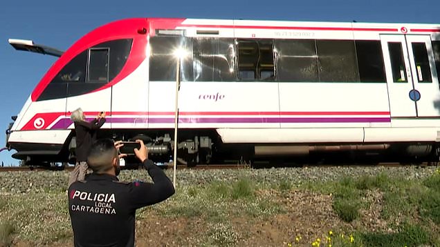 Emergency crews surround Train after crash in Cartegena