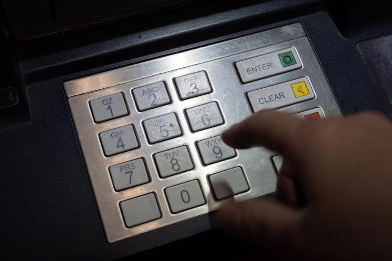 Prices ticked up in November as Americans keep spending, a key ...