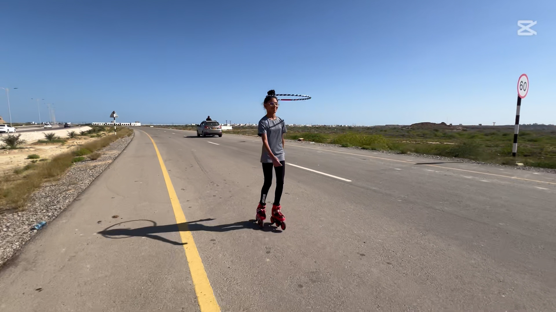 Longest duration roller/inline skating while hula hooping around a hair ...