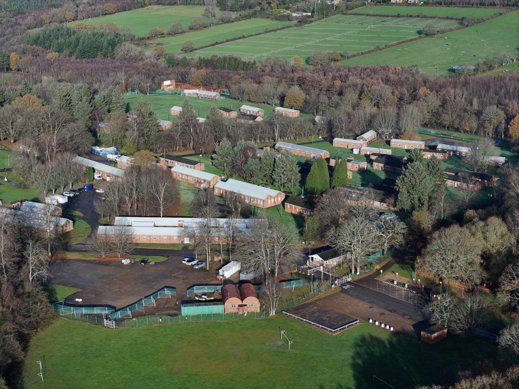 First migrants moved into old army camp in Crowborough despite weeks of ...