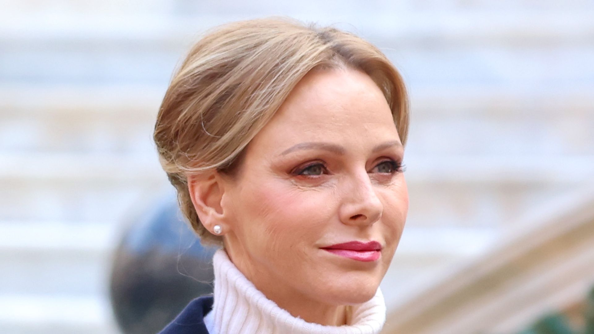 Princess Charlene softens 'sharp' Max Mara suit with girly balletic hair