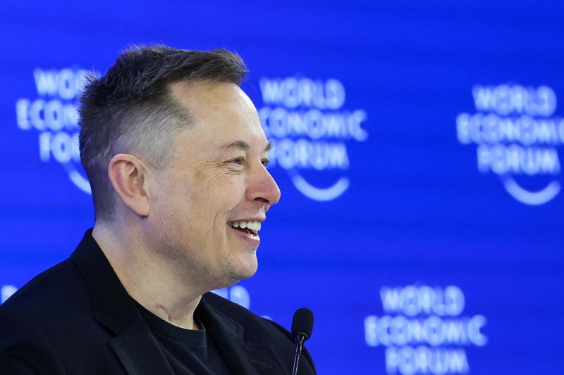 In Davos debut, Musk says US tariffs make solar power a challenge