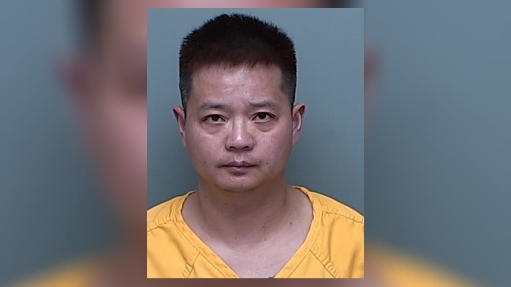 Man charged after local scammed out of large amount of money