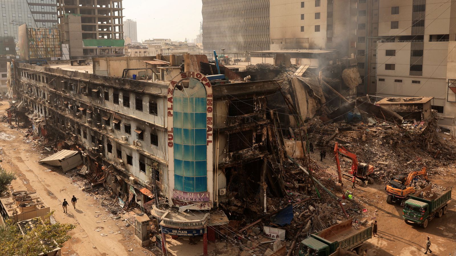 Remains of dozens more people recovered from shopping centre fire in ...