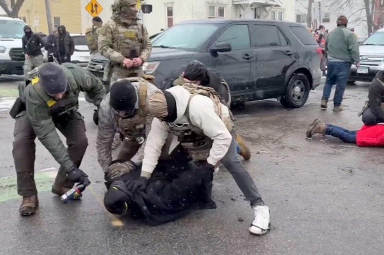 ICE sprays pepper spray directly into face of already pinned protester