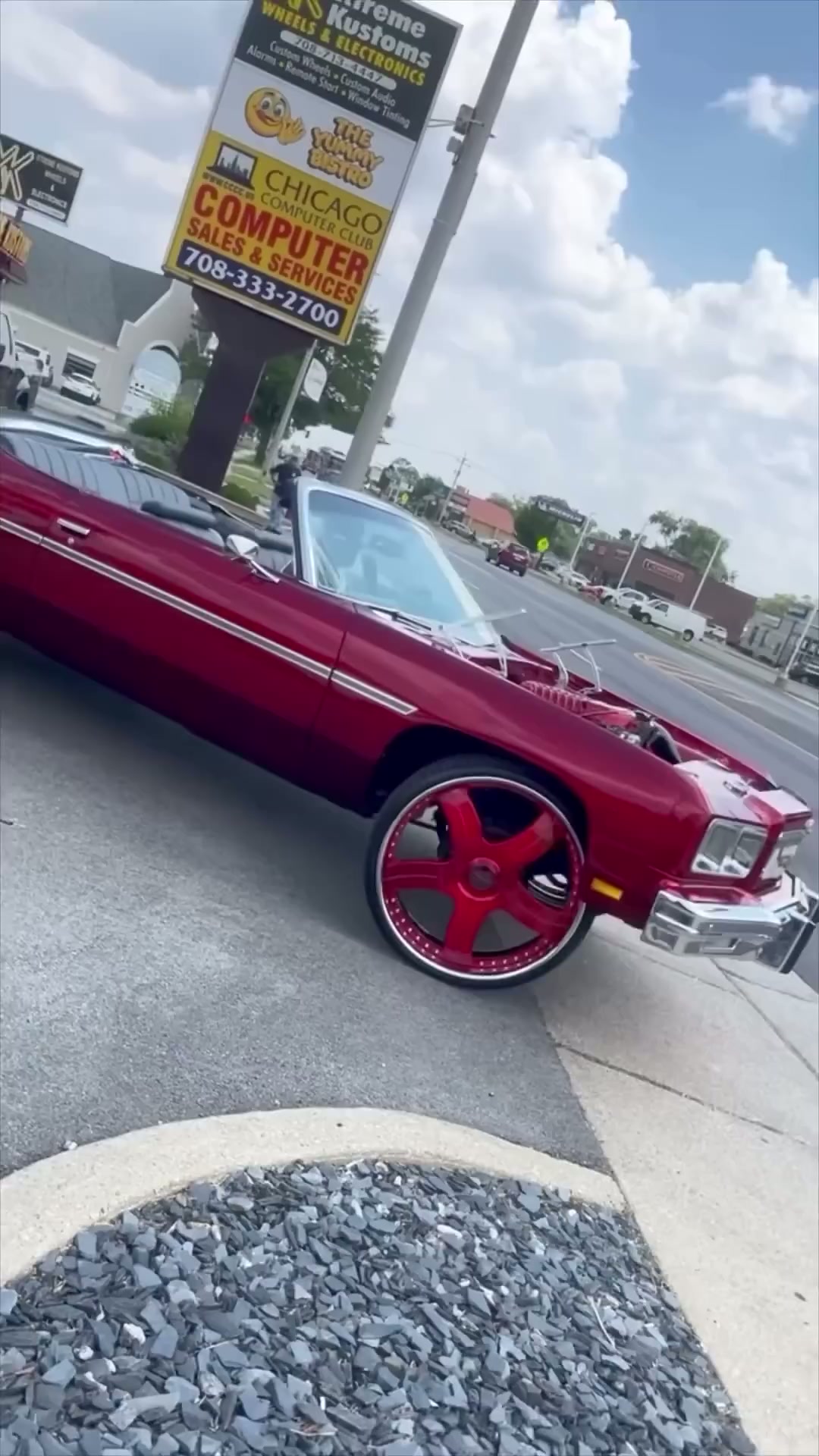 Red '75 Chevy vert on 30’s riding