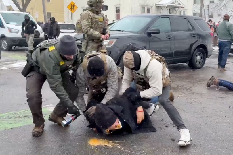 ICE sprays pepper spray directly into face of already pinned protester