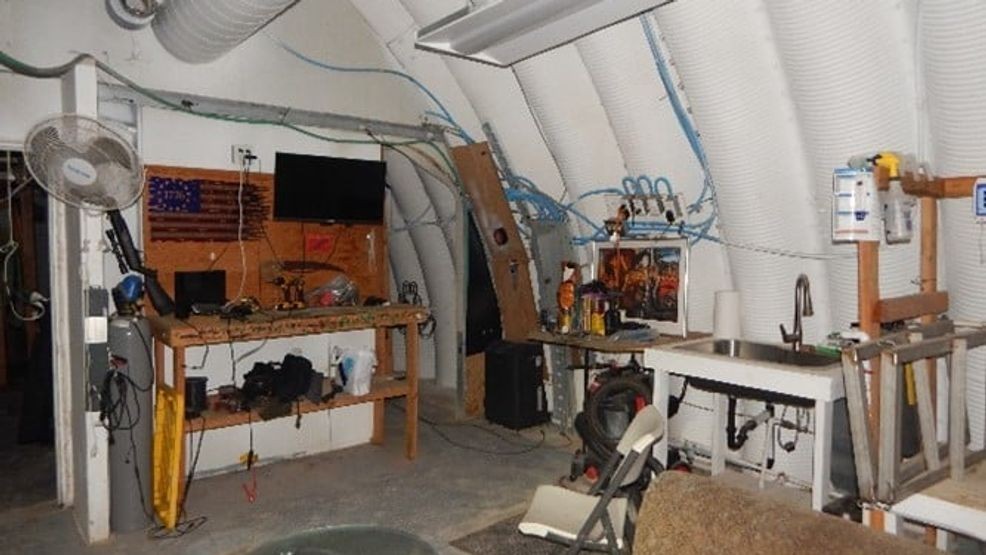 Underground bunker and large arsenal uncovered during marijuana grow ...