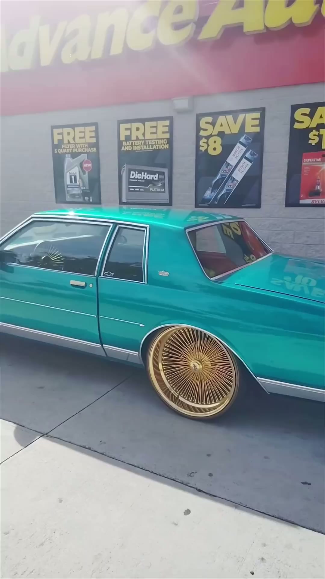2-door Chevy box on gold 24’s Daytons