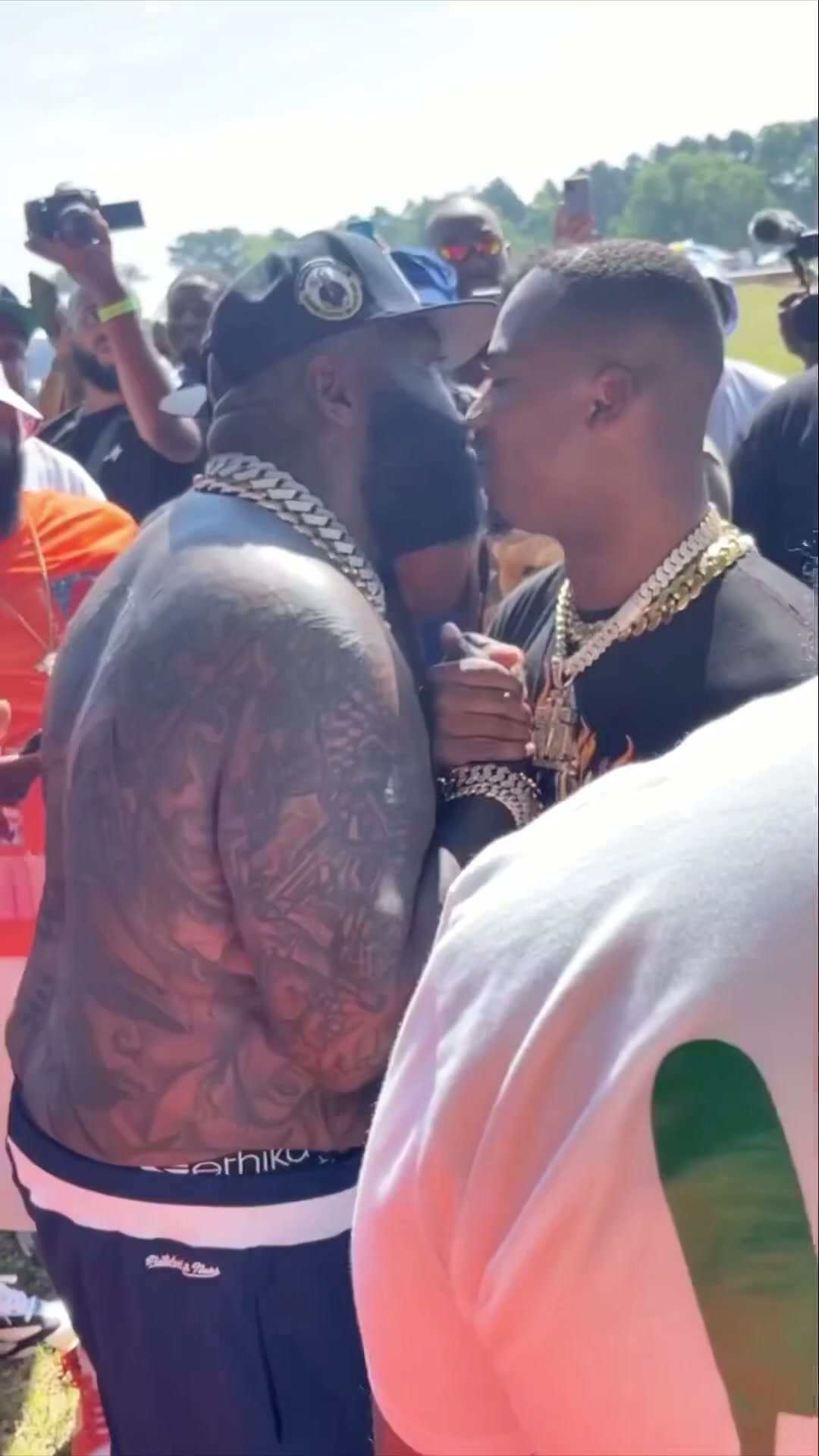 Rick Ross and Fredrarri Choppin it up at the Carshow