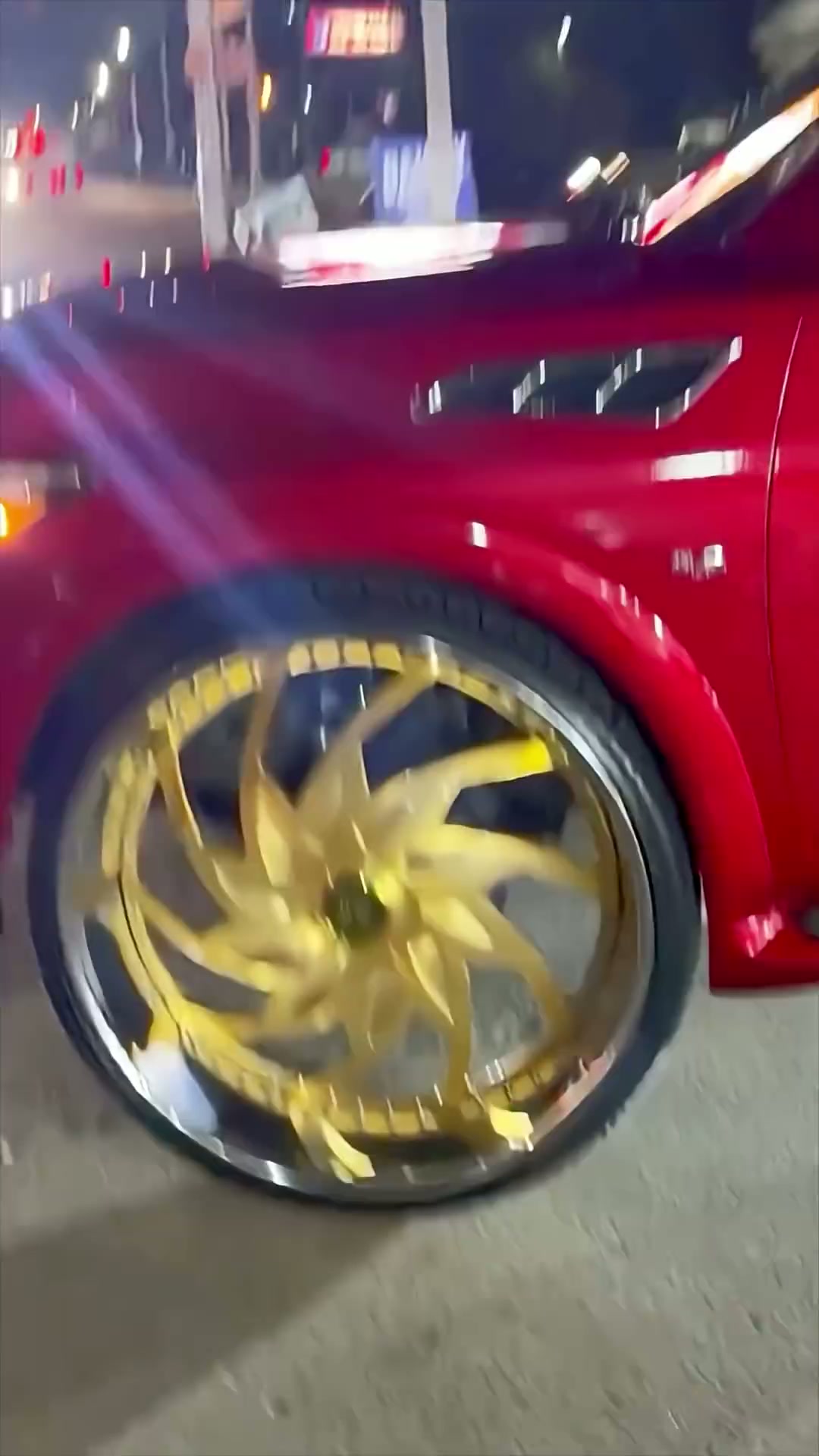 Candy red Infiniti QX on brushed gold 32’s Rucci