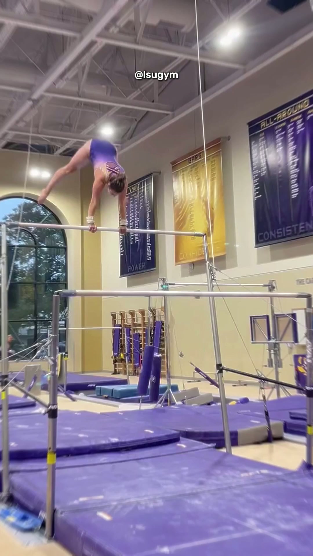 Ashley Cowan on the bars