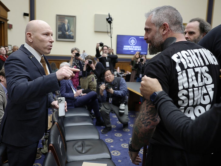 Ivan Raiklin gets in heated confrontation with ex-DC cop Michael Fanone