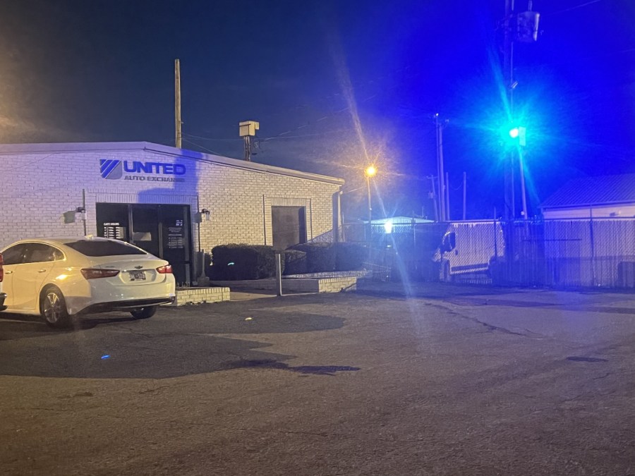 2 detained after repossessed BMW taken in carjacking