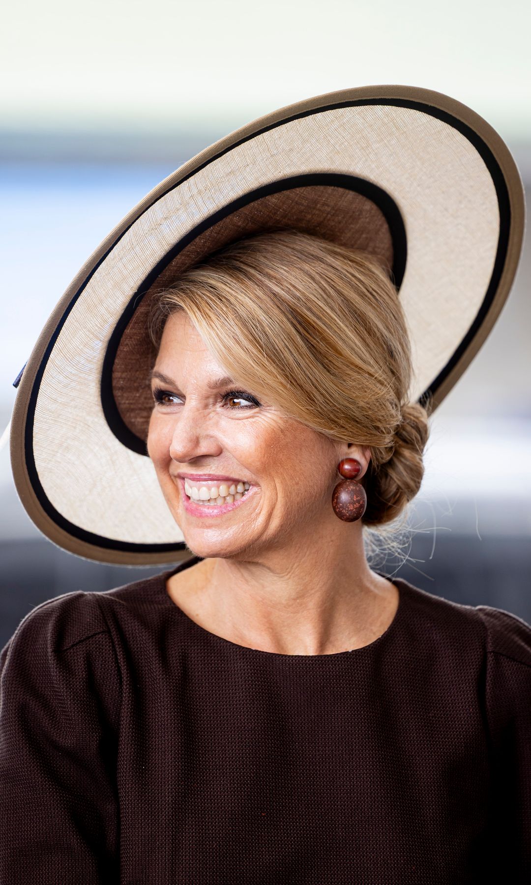 Queen Máxima switches things up, trading her brooches for a trendy ...