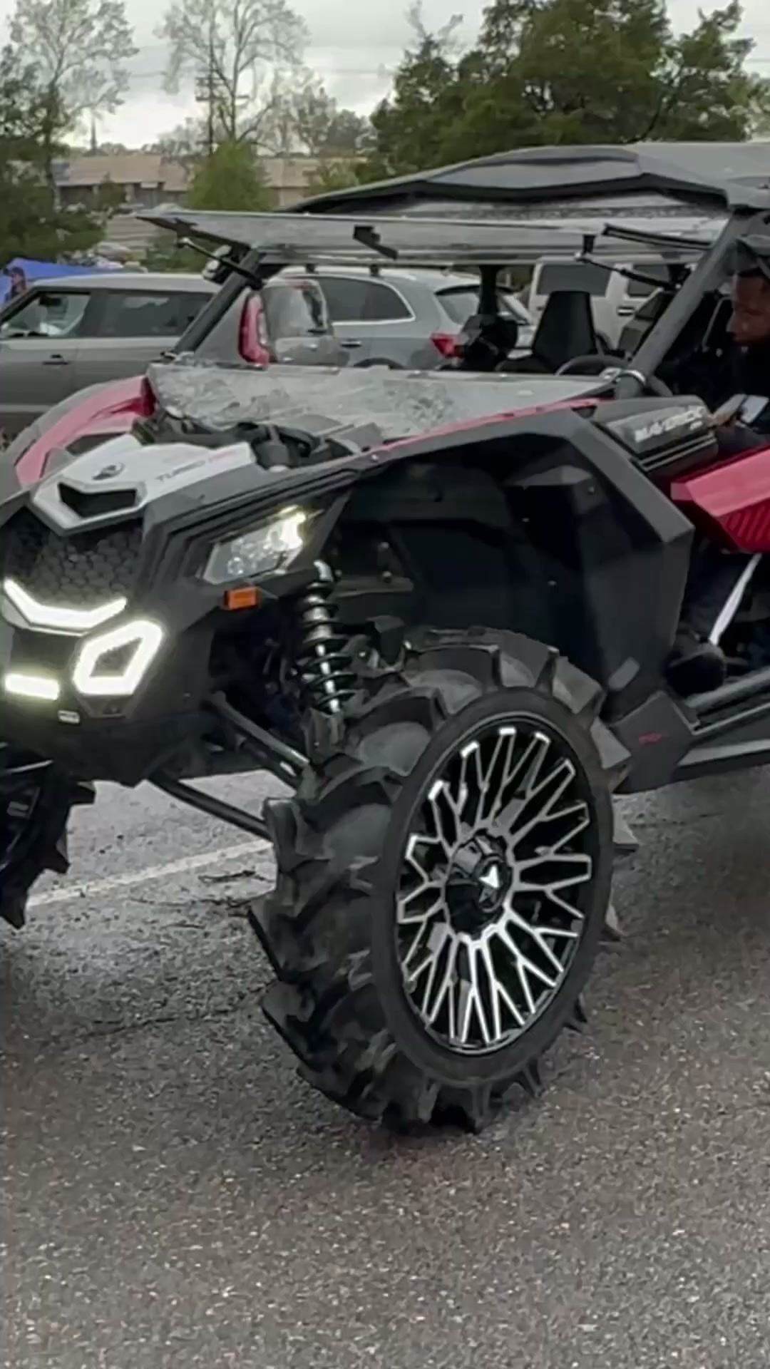 Bro comin thru in that side-by-side at the carshow