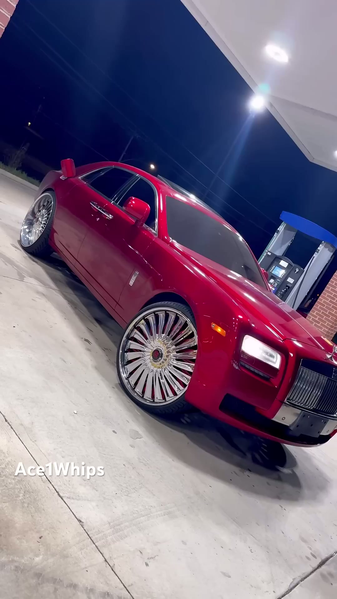 Candy red Rolls-Royce Ghost on 28” DUB floaters in Memphis
