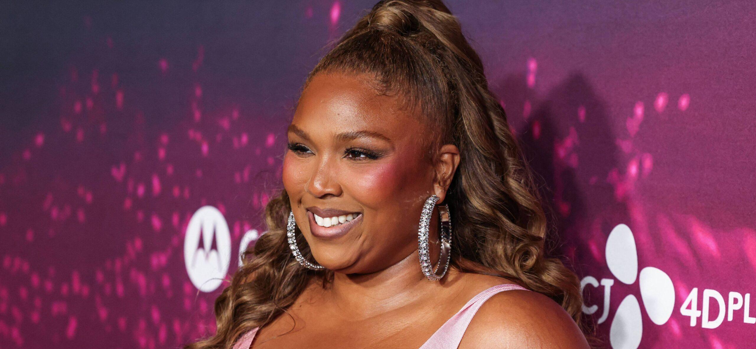 Lizzo begs blogs to take down pics of her from a red carpet event after ...