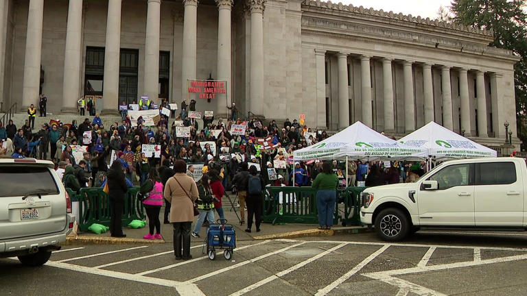 Hundreds rally at WA capitol building in support of immigrant rights