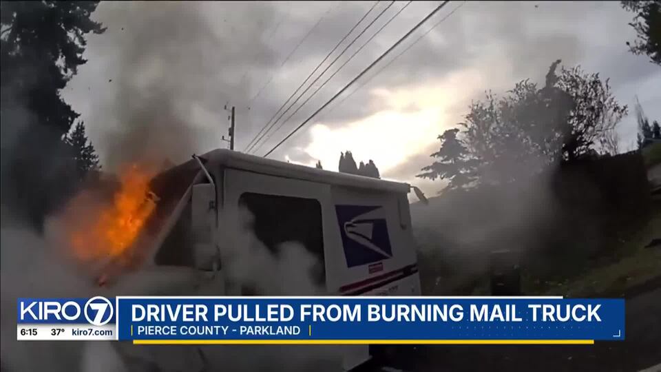 Video: Person pulled from burning mail truck in Parkland