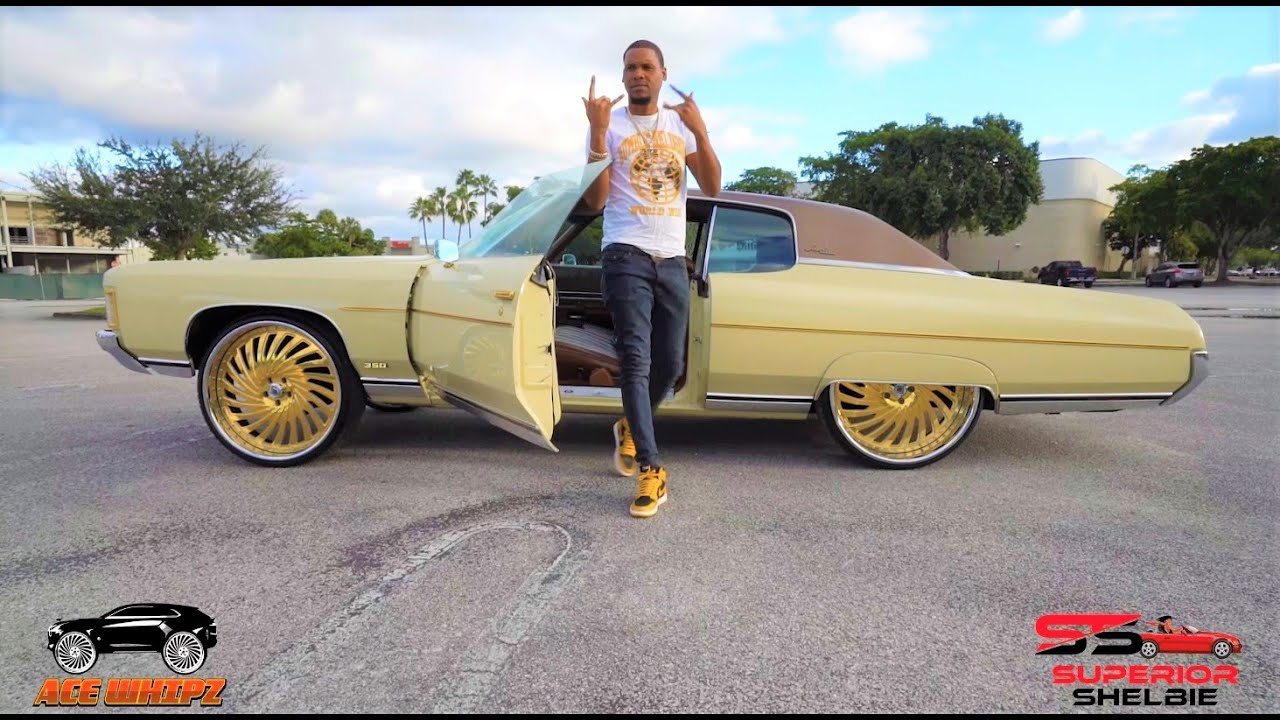 71 Chevy Impala donk on gold 26" Asanti wheels