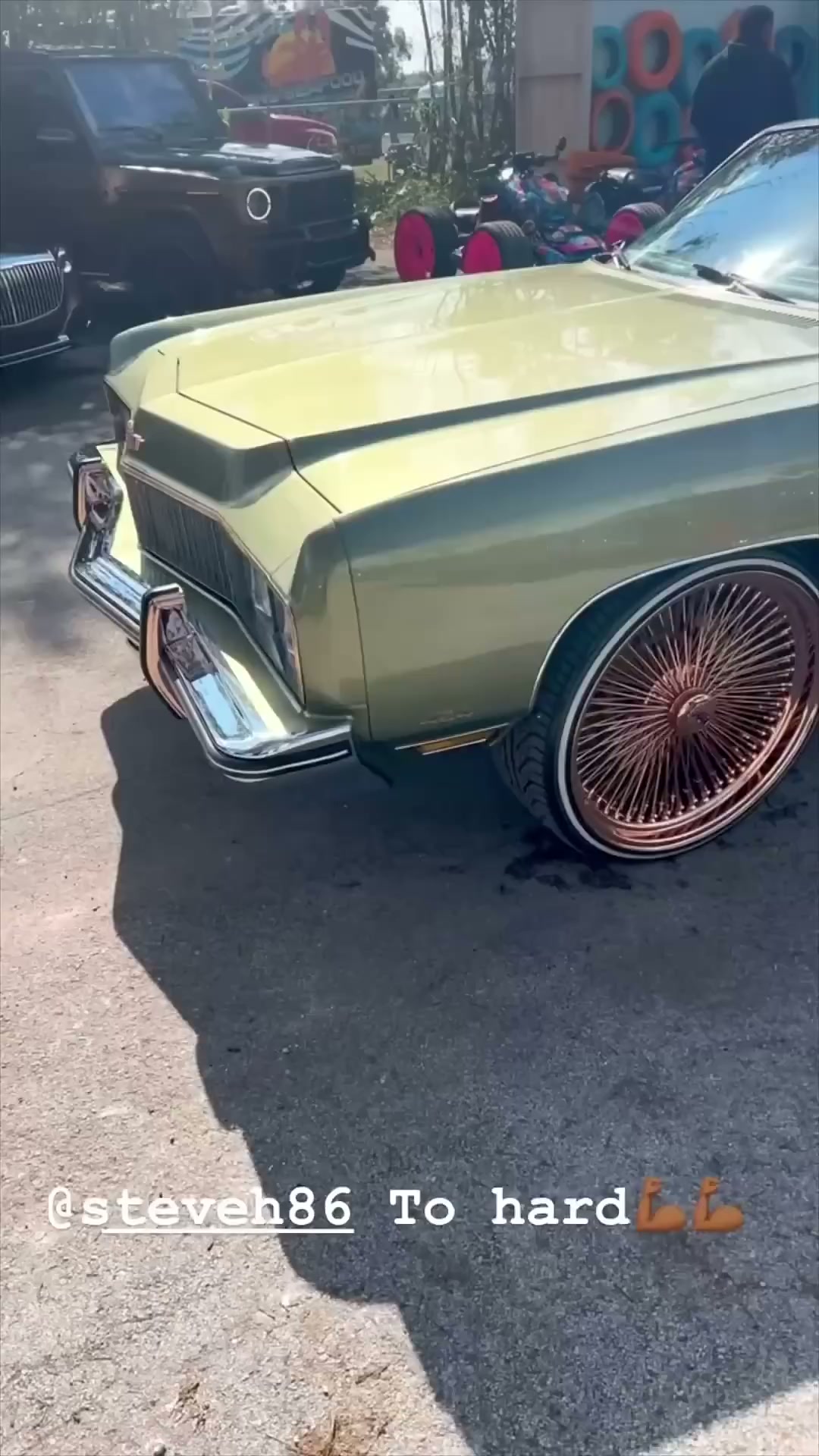 Olive Oyl Chevy vert on rosegold 24” Daytons coming thru top 5 carshow