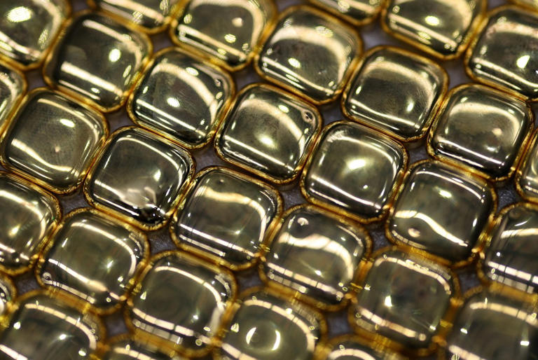 Gold approaches $5,000 milestone; US stock futures, global indexes mixed