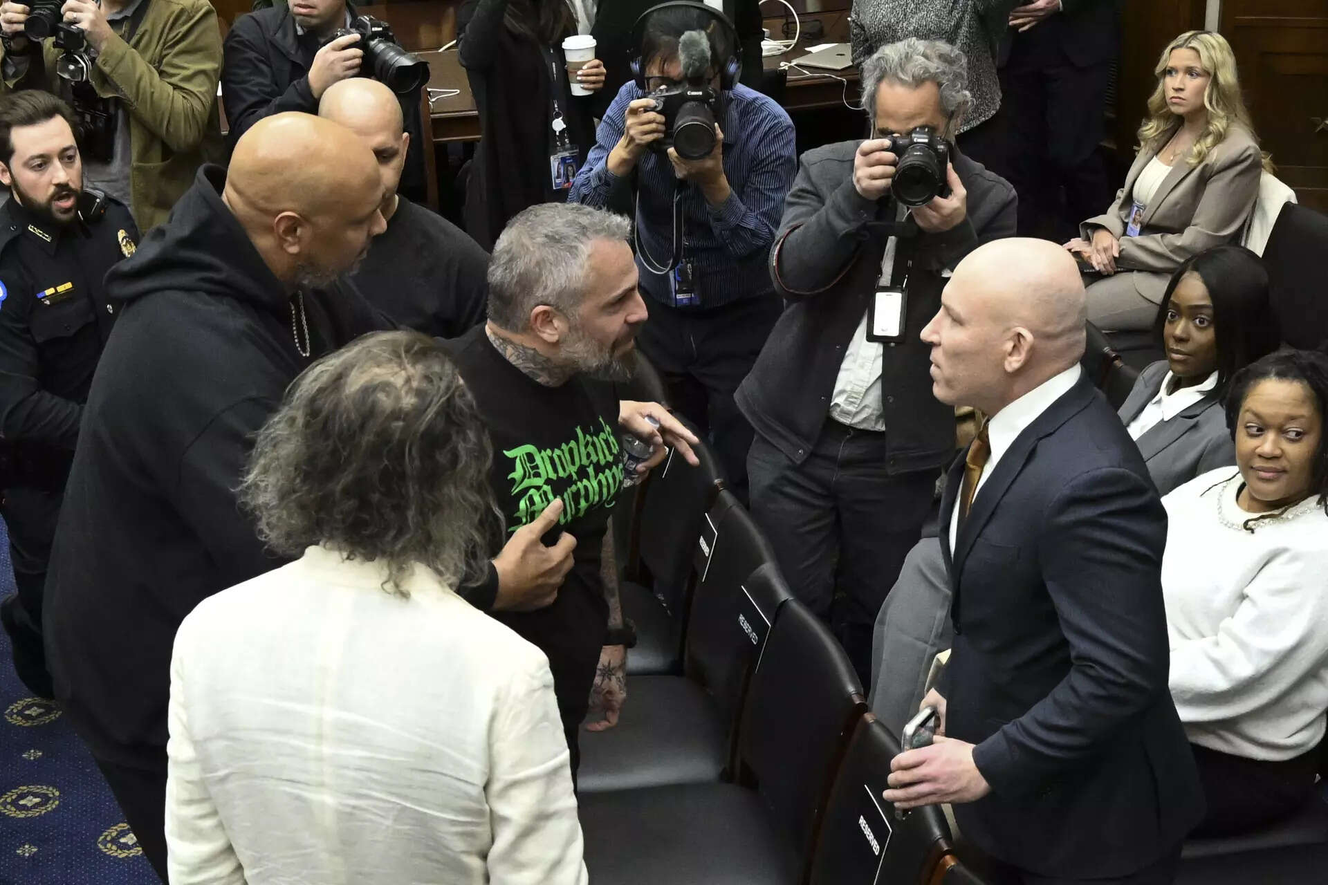 Ex-DC cop Michael Fanone, assaulted in Jan. 6 Capitol attack, escorted ...