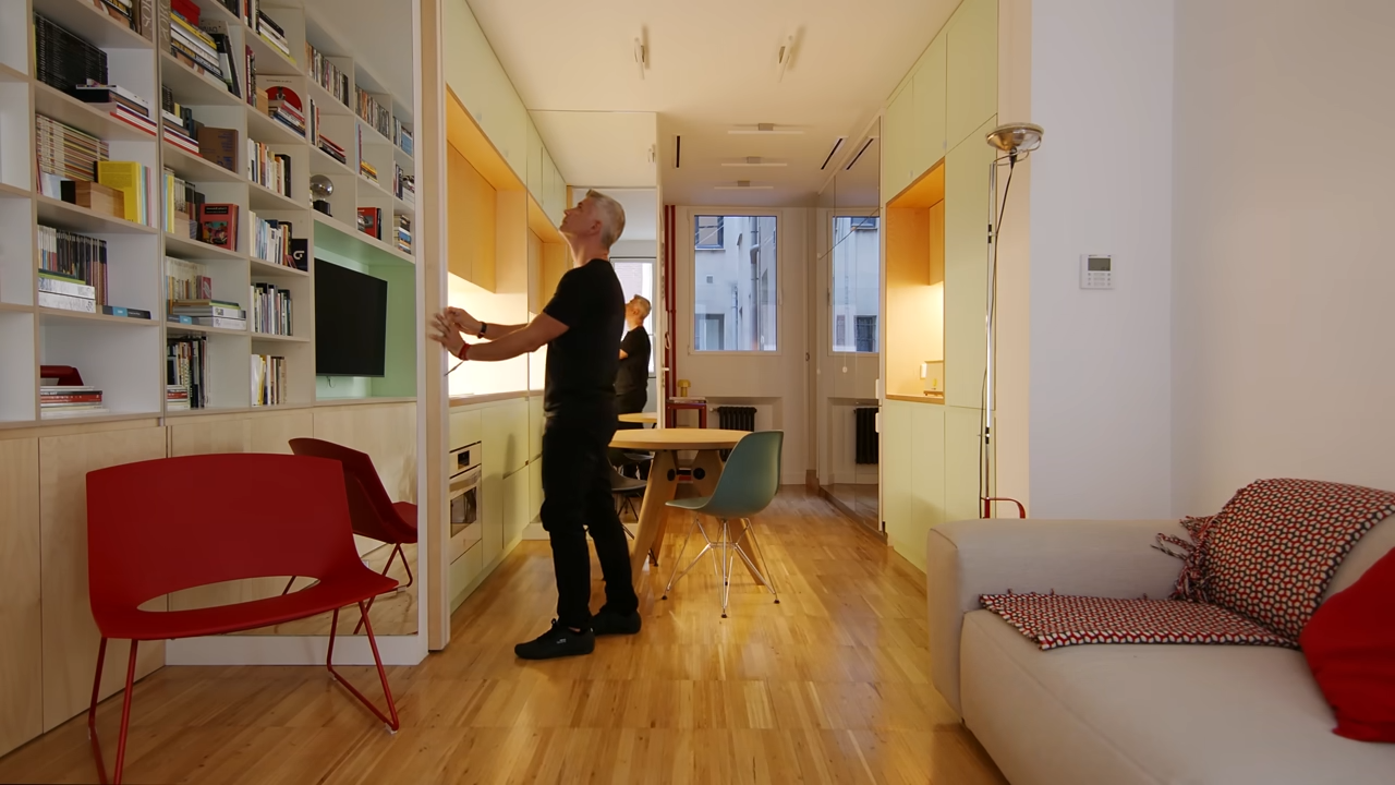 Who designs a home around books, light, and order? This journalist did