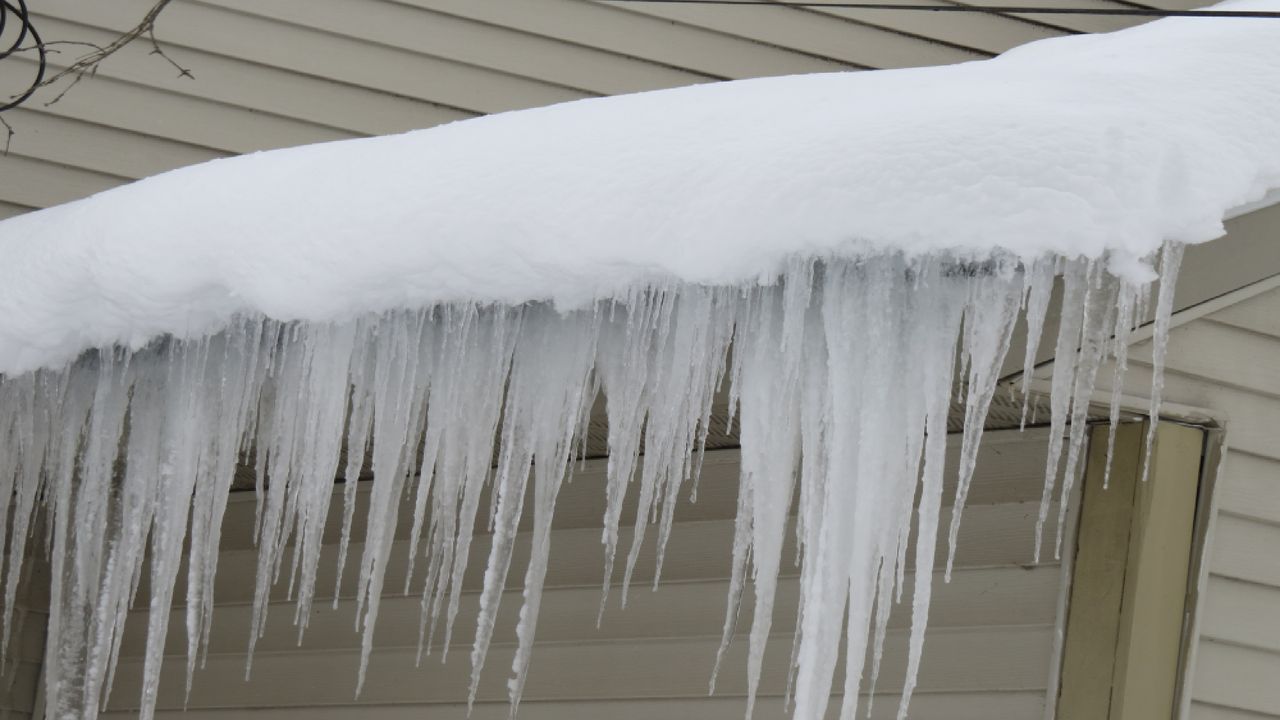 Never climb an icy roof to clear snow — here's the safe way to remove ...